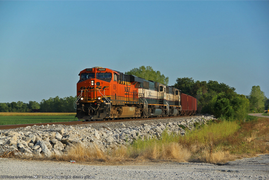 BNSF 6256 heads up a empty ore train with some nice power behind him.